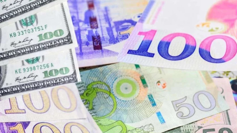 What is the exchange rate for a dollar, a euro in currency exchange booths?